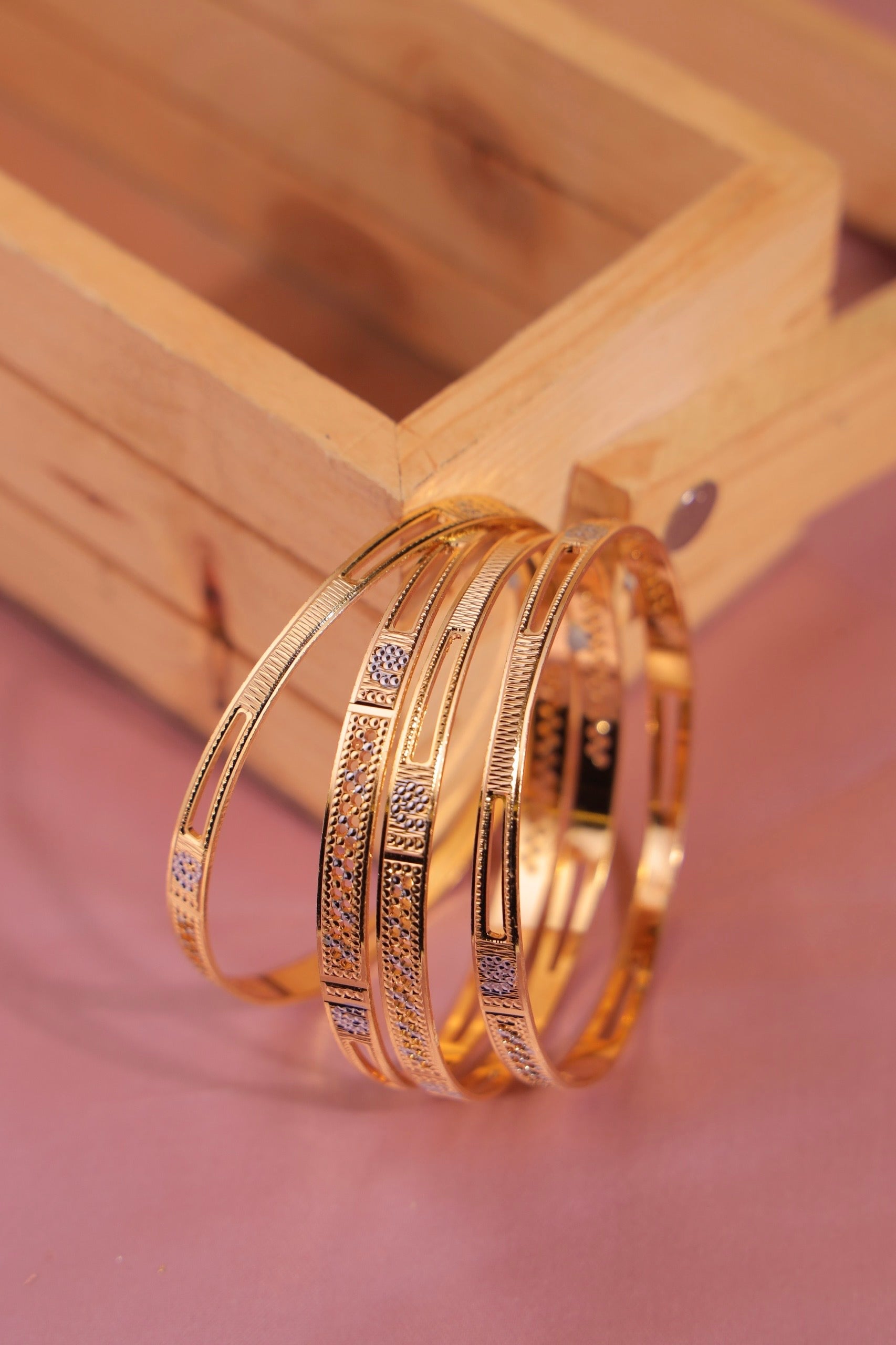 Gold bangles design set of 4 store